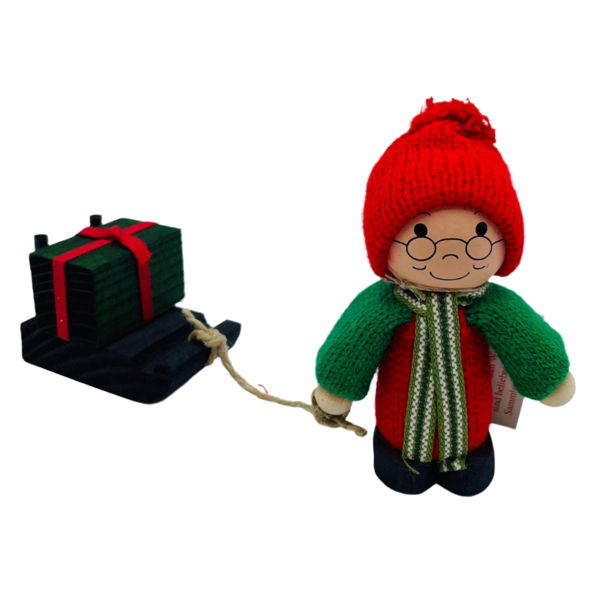 Swedish tomte pulling sled with gift – Gift Chalet