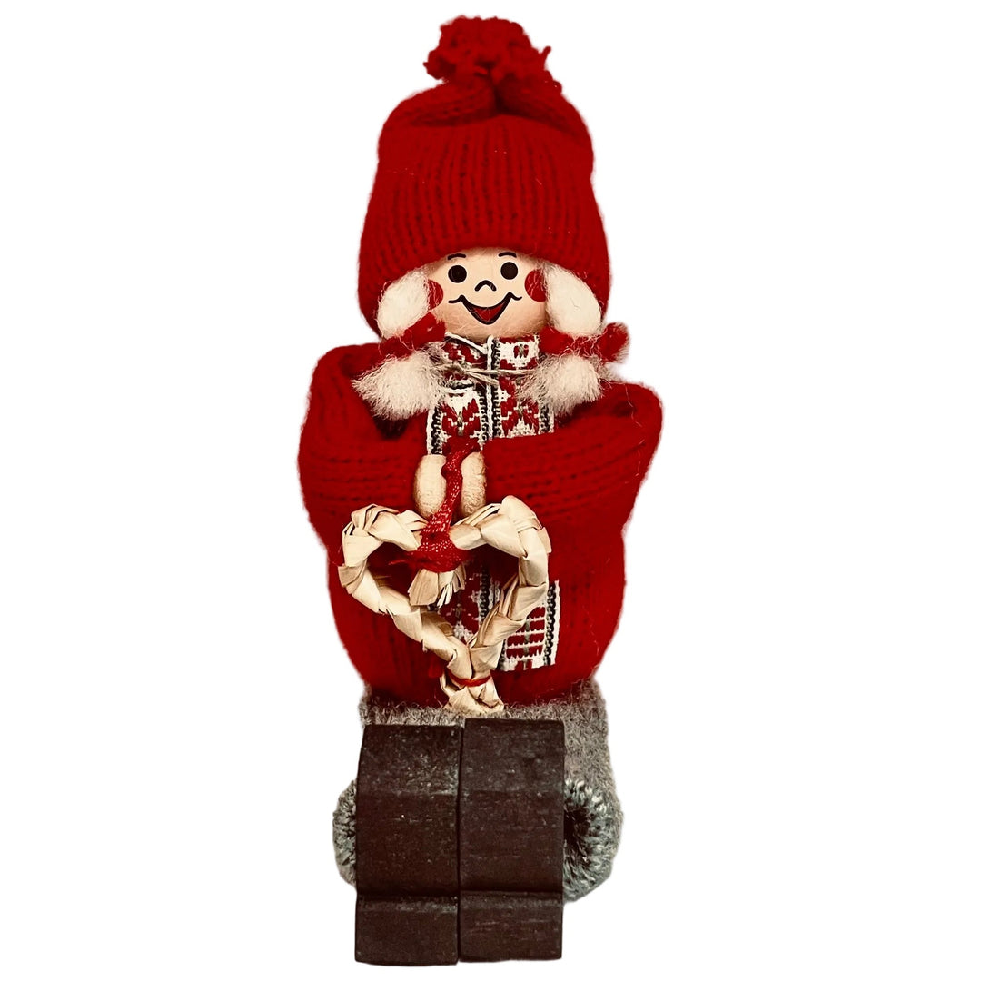Swedish tomte lady sitting with straw heart – Gift Chalet